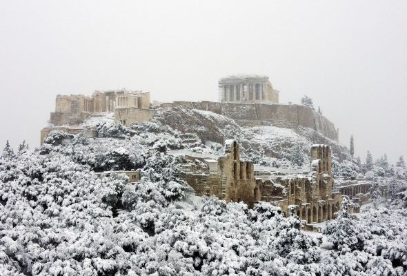 Acropolis covered by rare snow as cold snap hits Athens | AWANI ...