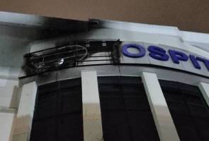 Papan tanda Hospital KPJ Ampang Puteri terbakar