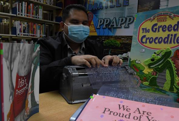 PwD gives back to community by translating braille reading materials ...