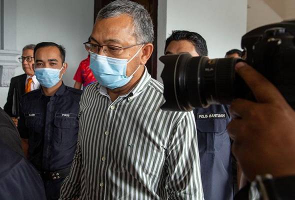 Azlan Man charged again with five counts of money laundering amounting ...