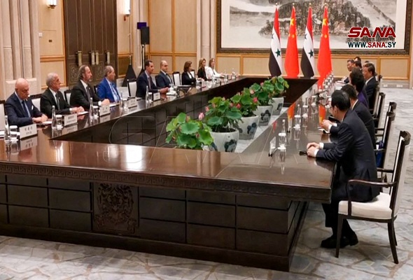 China's Xi offers to help war-torn Syria rebuild, regain regional ...