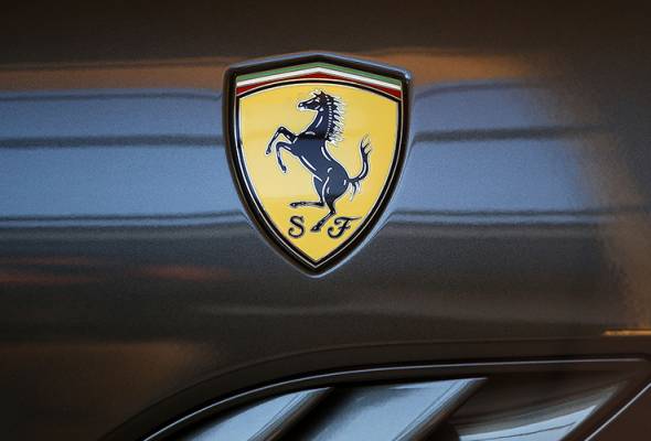 Ferrari shares at record high after sensational Hamilton signing ...