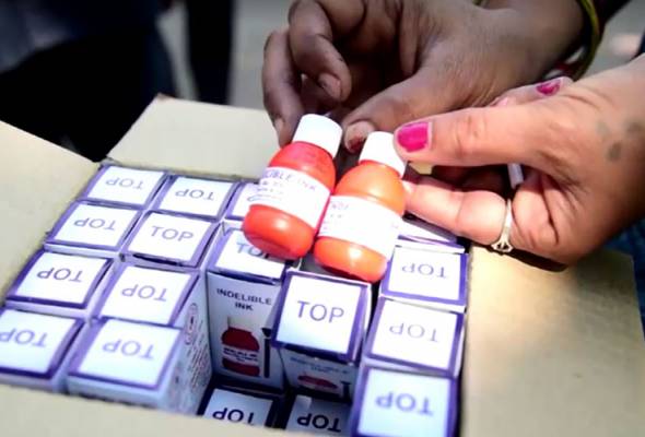 Purple fingers and indelible ink are the hallmarks of India's elections ...