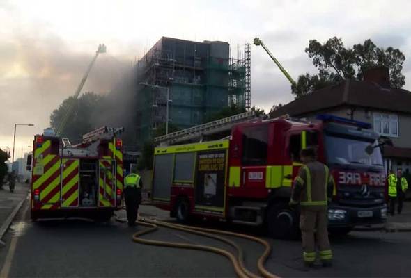 Over 100 evacuated, two in hospital as fire engulfs London building ...